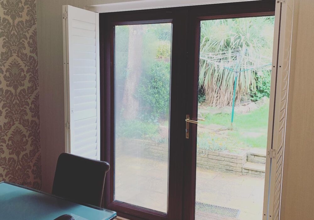 Door and Track System Shutters Manchster | Crafted Shutters